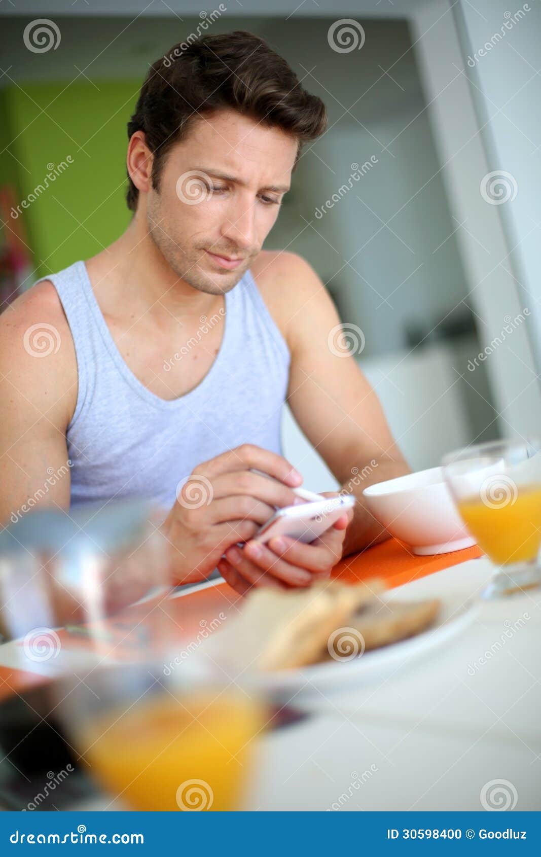 Checking Emails in the Morning Stock Photo - Image of smartphone, blond ...
