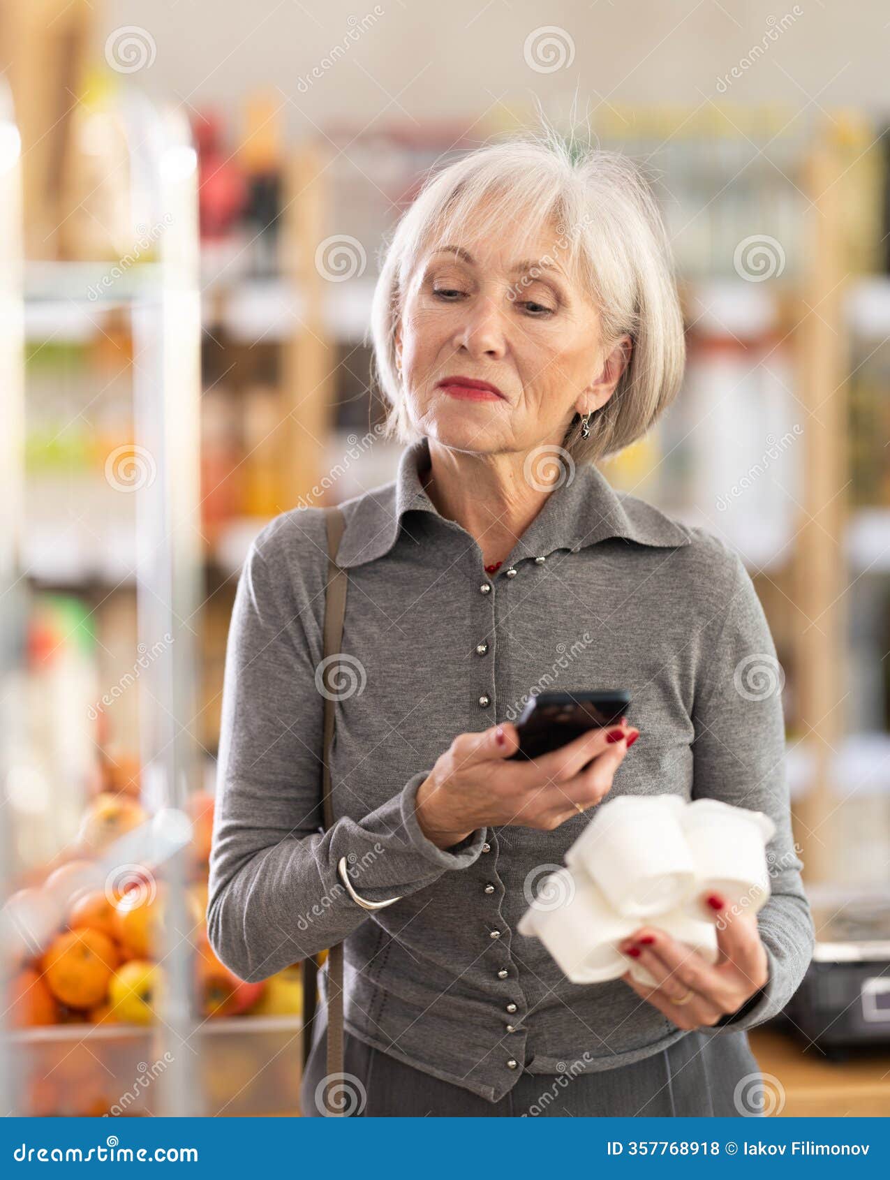 Checking Expiration Date of Yogurt - Elderly Female Shopper Scans QR ...