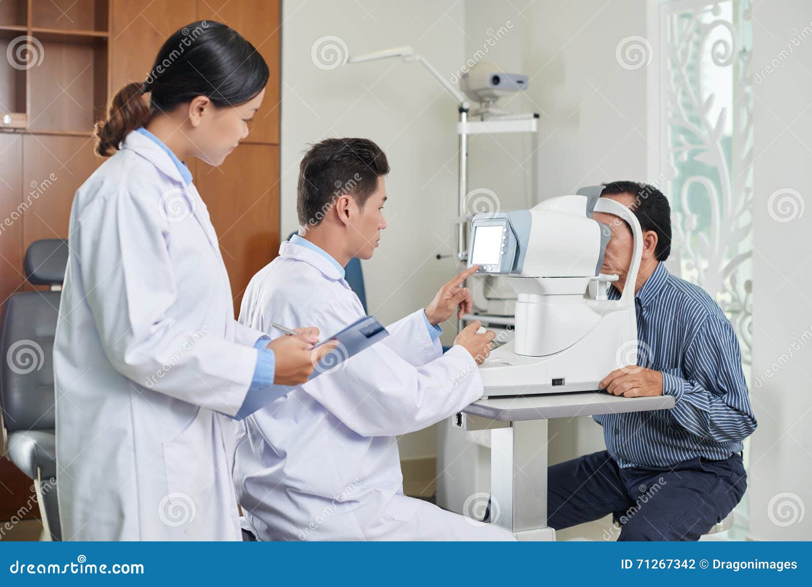 Checking eyesight stock photo. Image of cataract, eyesight - 71267342