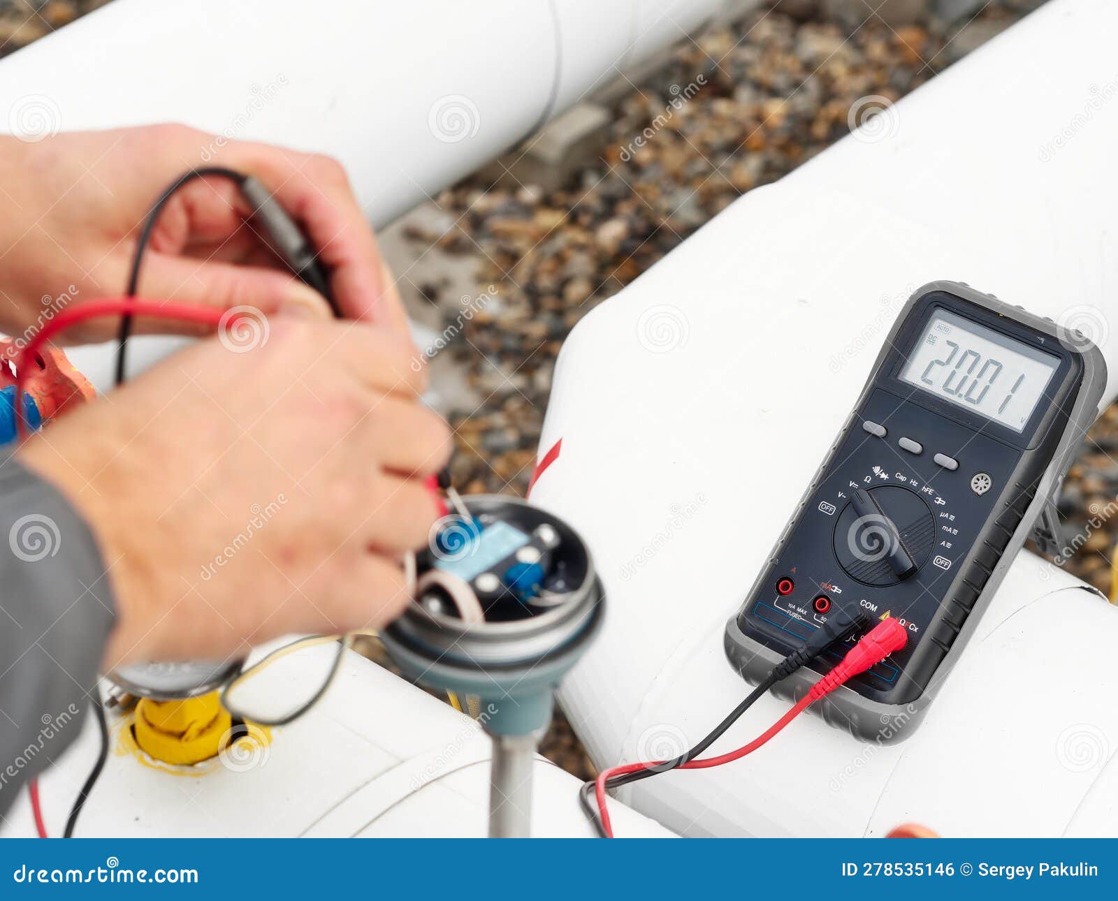 Checking Gas Equipment Sensor with Multimeter. Close-up Hands ...