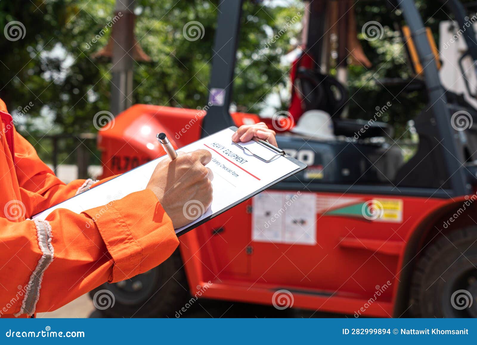 Checking on Heavy Equipment Checklist, Industrial Safety Working. Stock ...