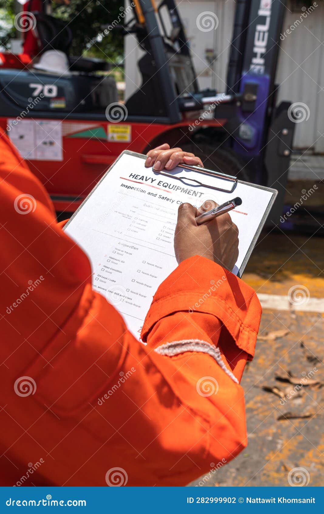 Checking on Heavy Equipment Checklist, Industrial Safety Working. Stock ...