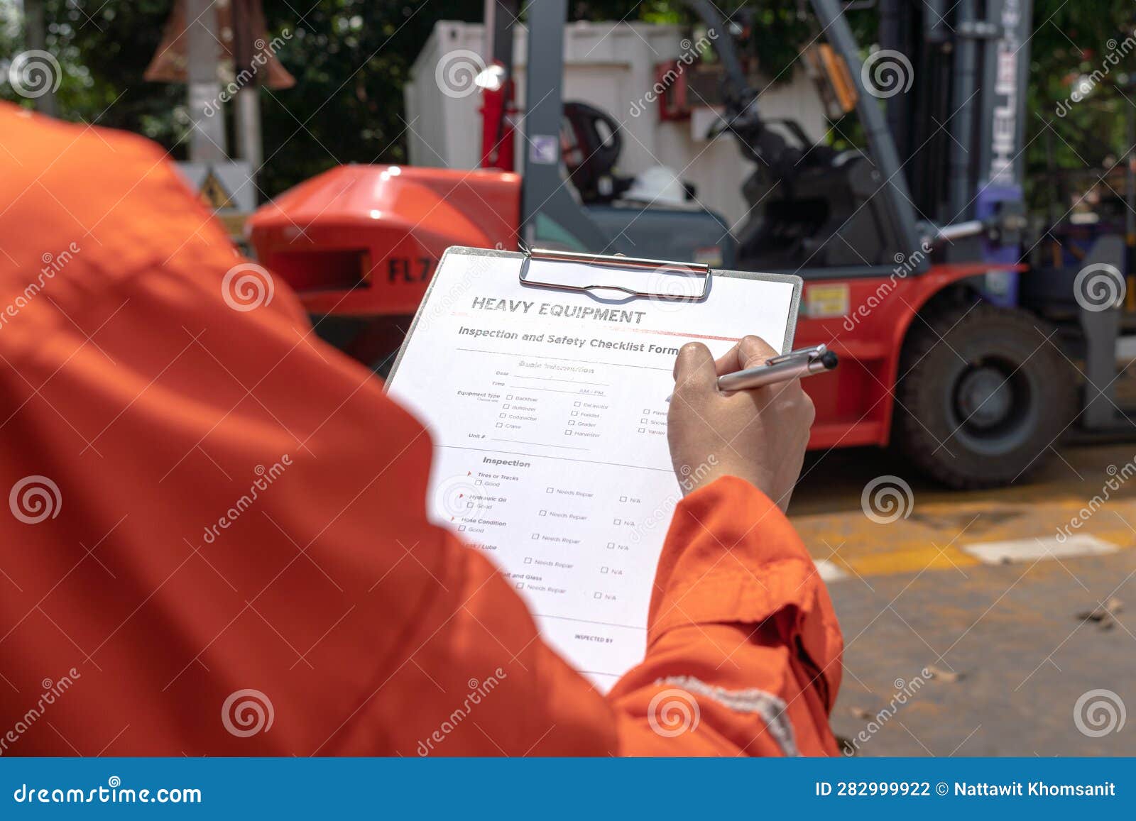 Checking on Heavy Equipment Checklist, Industrial Safety Working. Stock ...