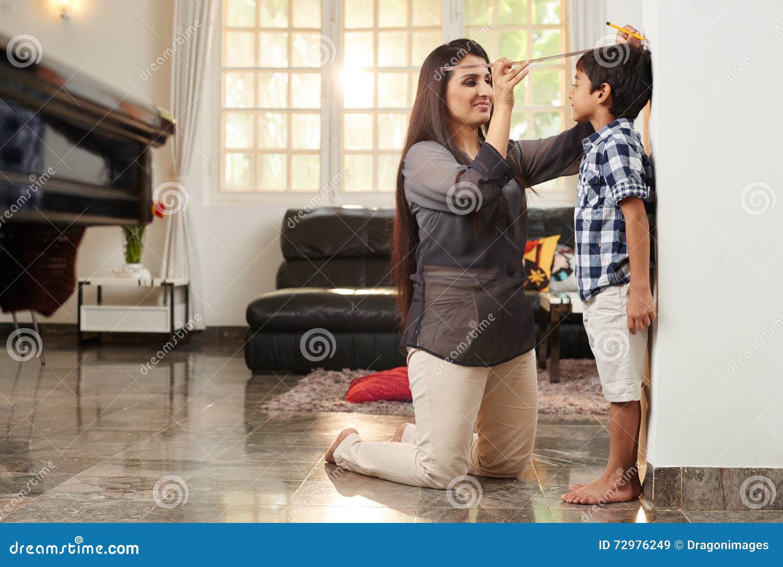 Checking the height stock image. Image of wall, grow - 72976249