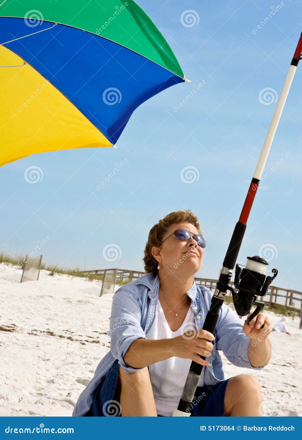 Checking Her Line stock photo. Image of landscape, cheerful - 5173064