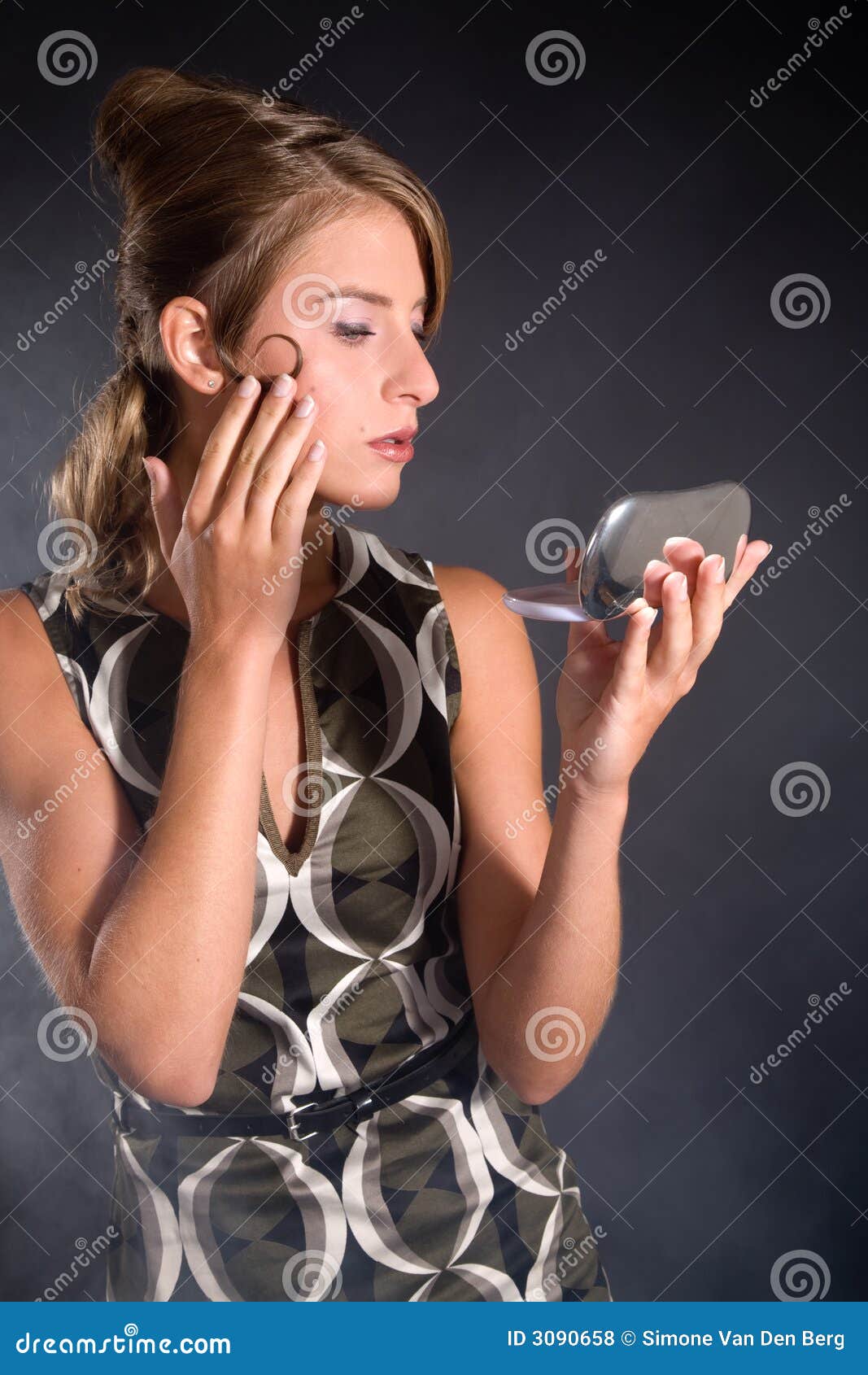Checking her makeup stock photo. Image of dress, women - 3090658