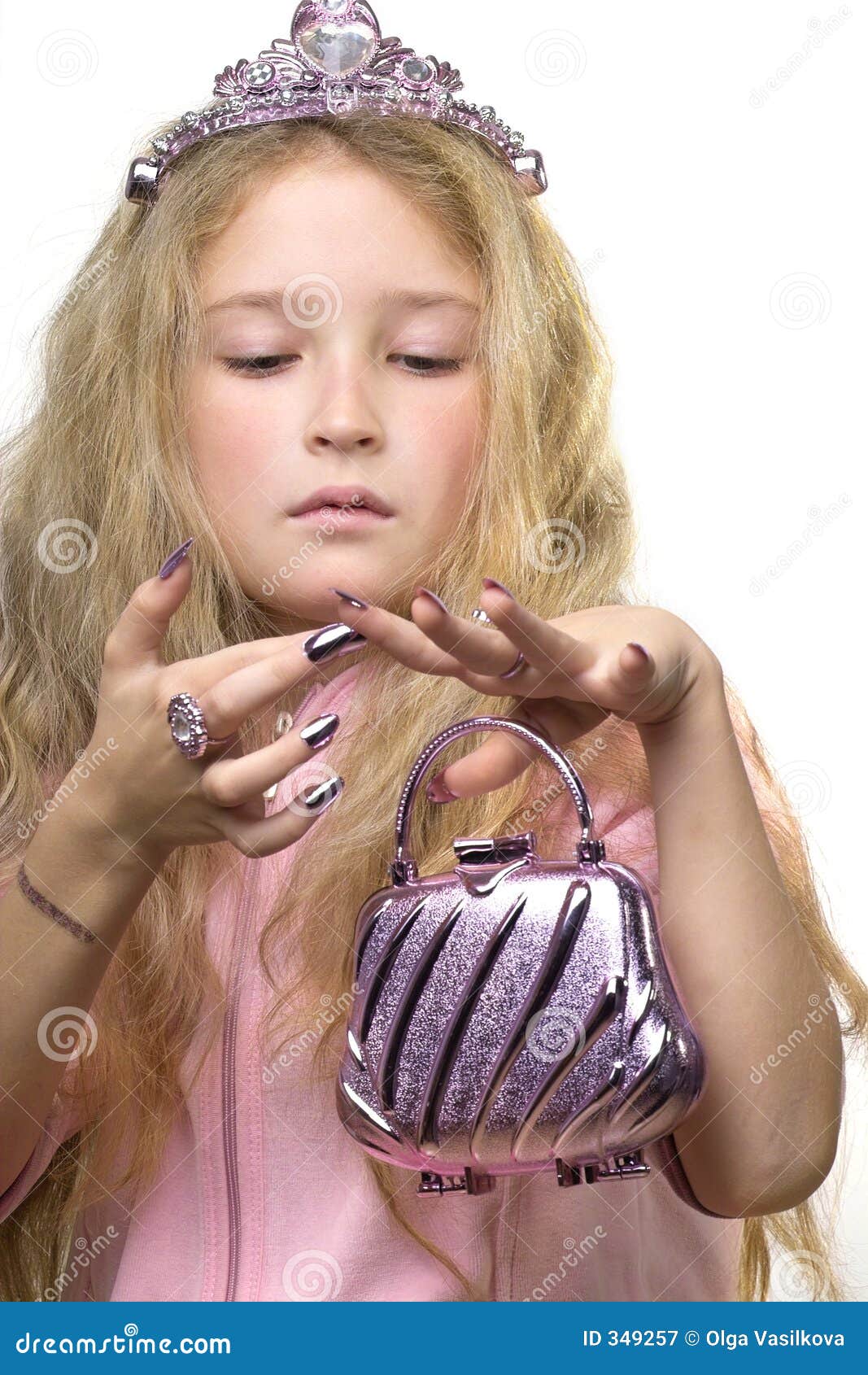 Checking her manicure stock image. Image of fashion, cute - 349257