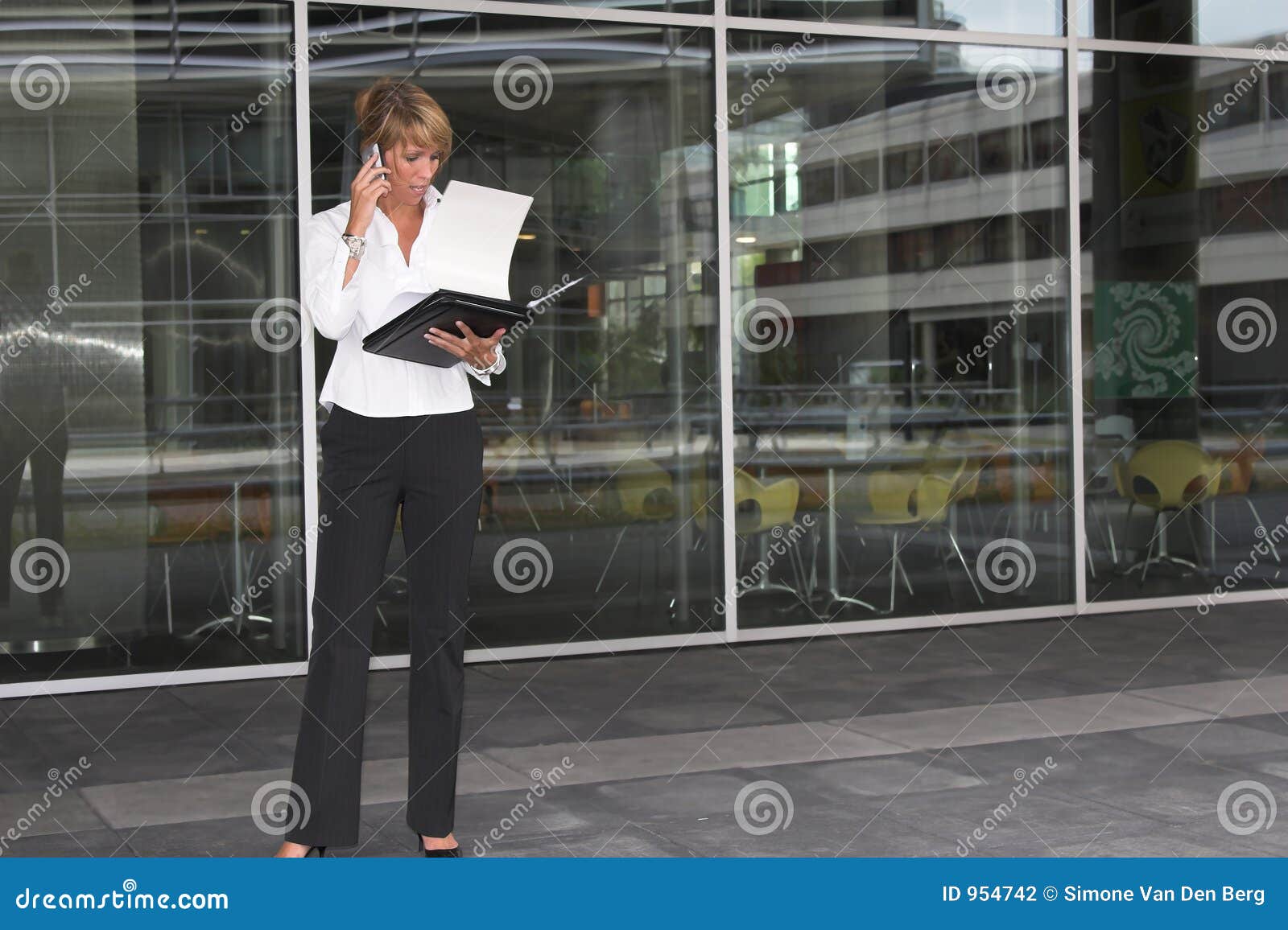 Checking her notes stock photo. Image of calling, note - 954742
