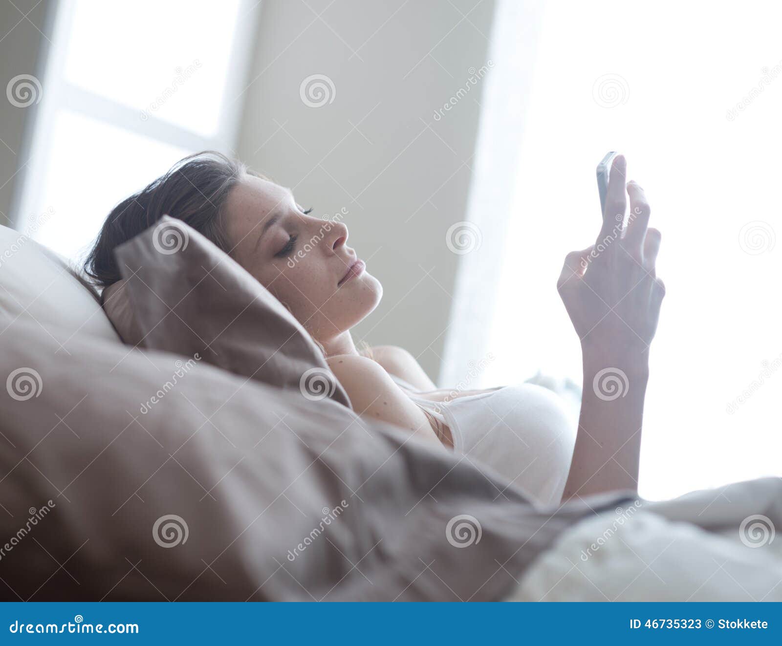 Checking her texts stock image. Image of house, message - 46735323