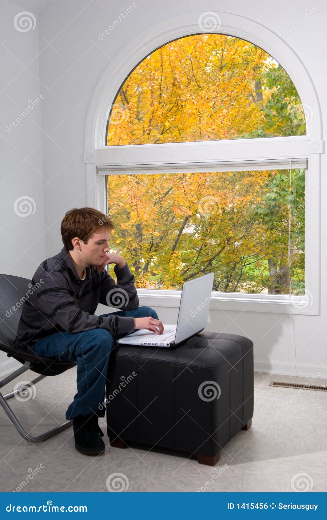 Checking his email stock photo. Image of notebook, computer - 1415456