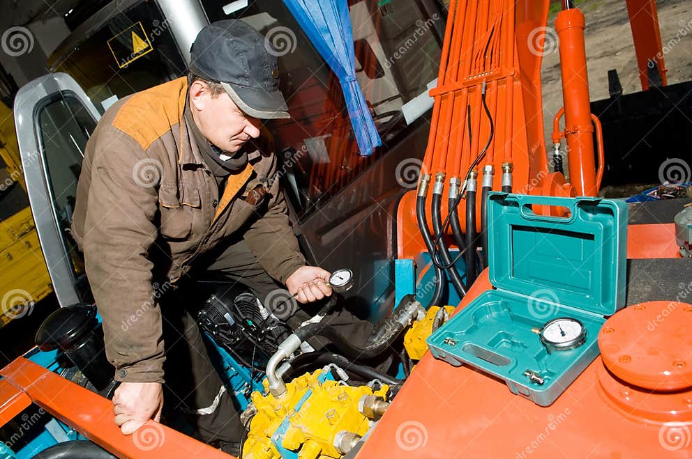 Checking hydraulic system stock photo. Image of controlling - 16329242