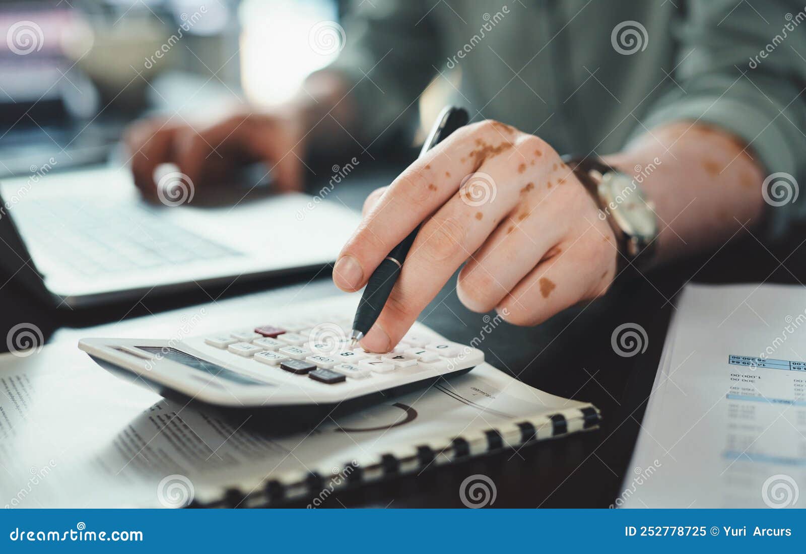 Checking If My Calculations are Correct. an Unrecognizable Businessman ...