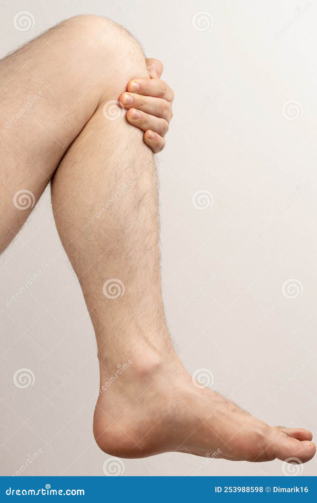 Checking leg knee stock photo. Image of swelling, touching - 253988598