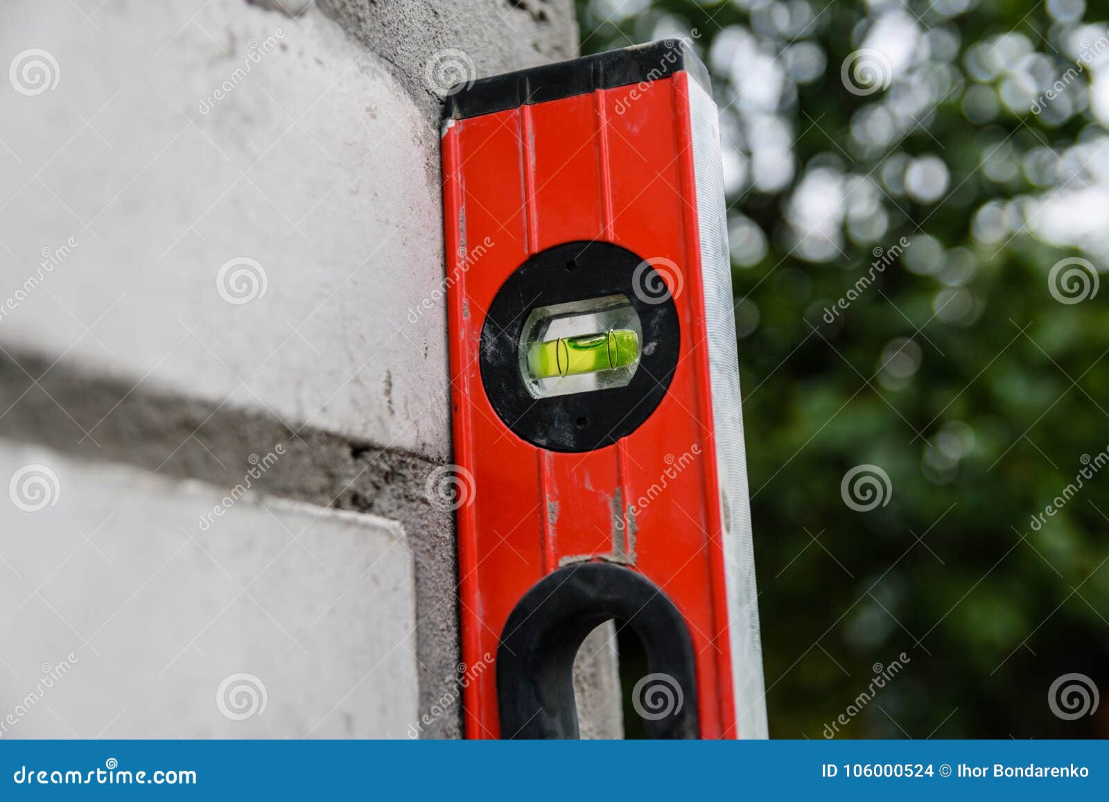 Checking the Level of a Brick Wall with Waterpas Stock Photo - Image of ...