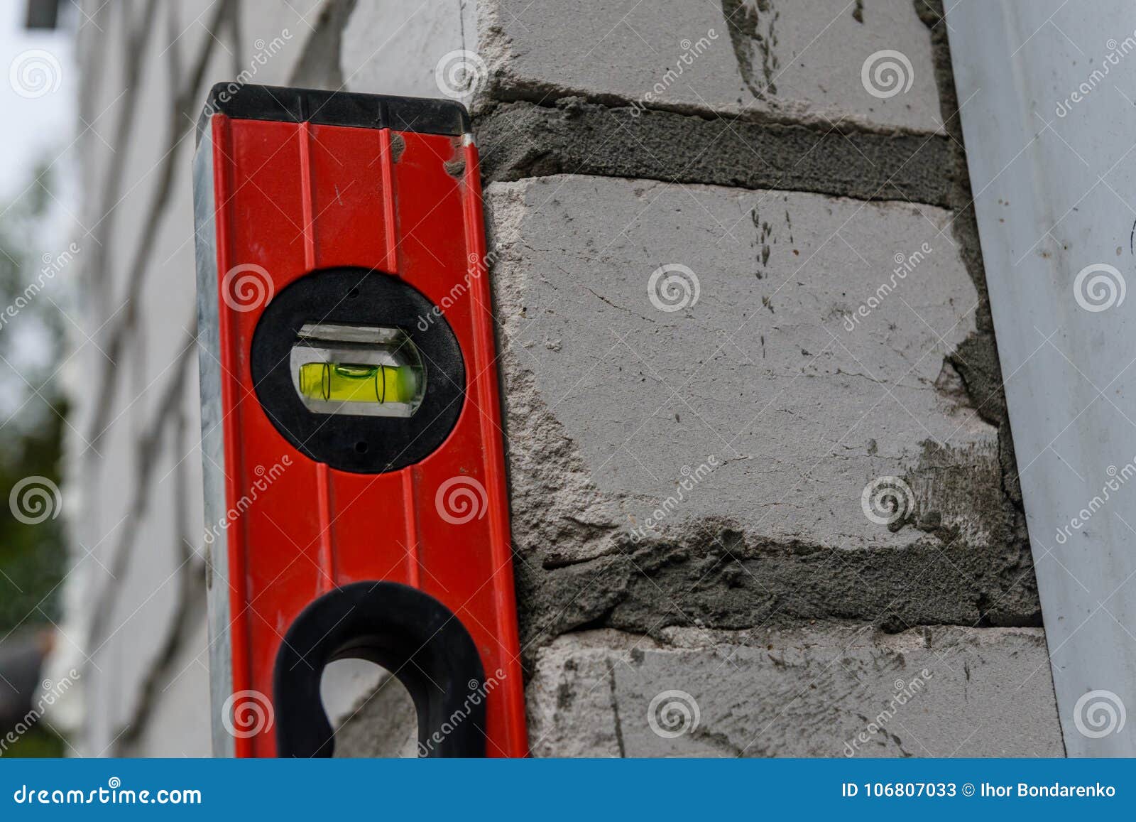 Checking the Level of a Brick Wall with Waterpas Stock Image - Image of ...