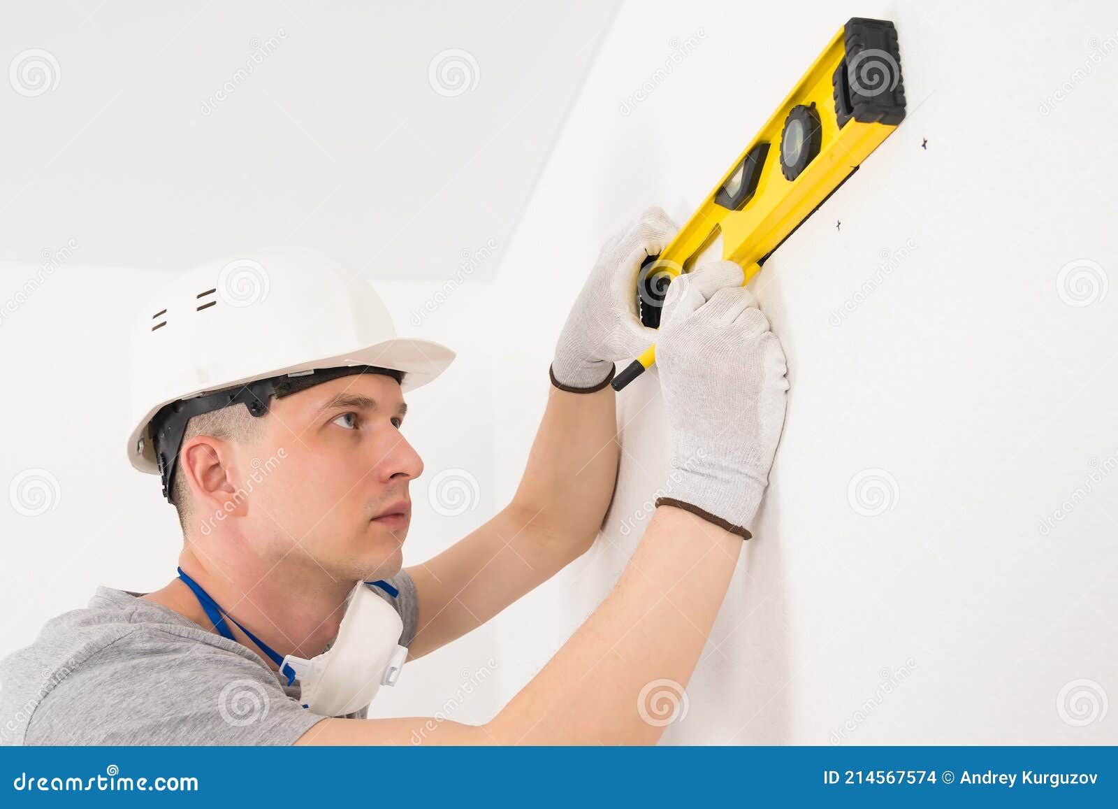 Checking the Level of the Installed Wall Mount by the Worker Stock ...