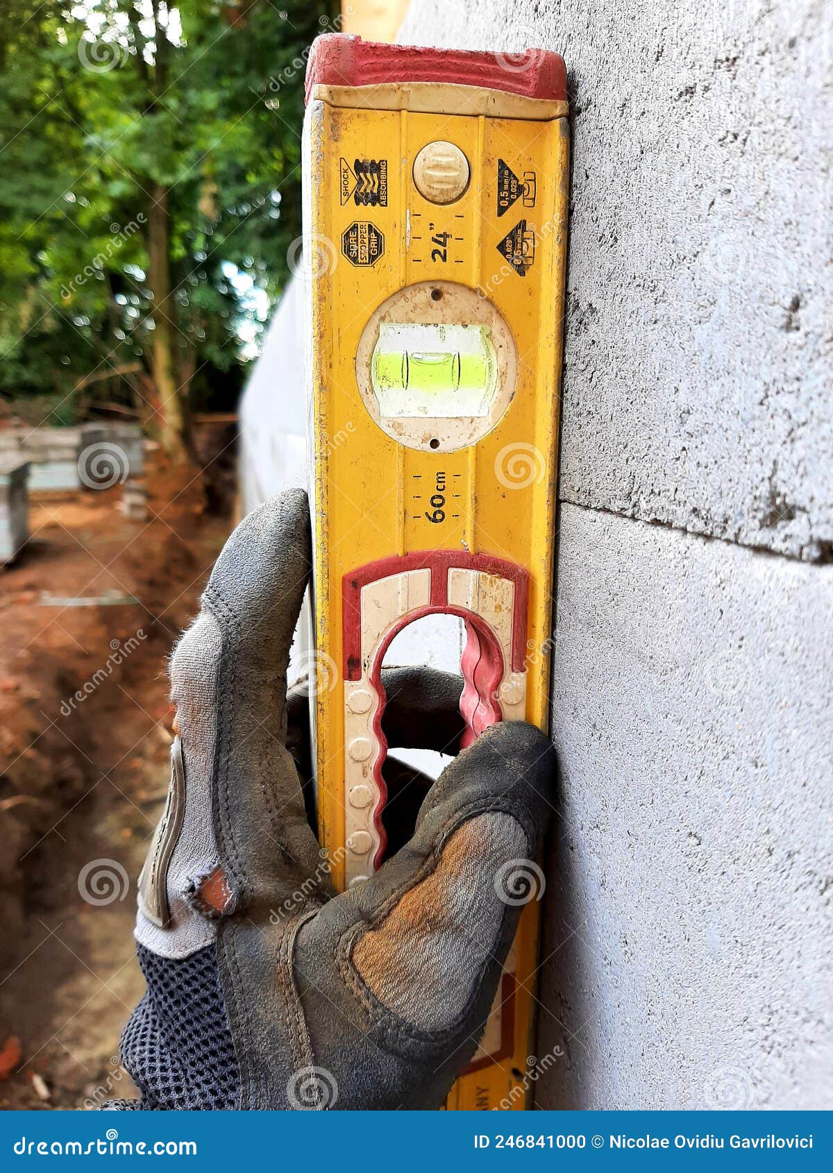 Checking Level of the Wall with the Level Tool Stock Photo - Image of ...