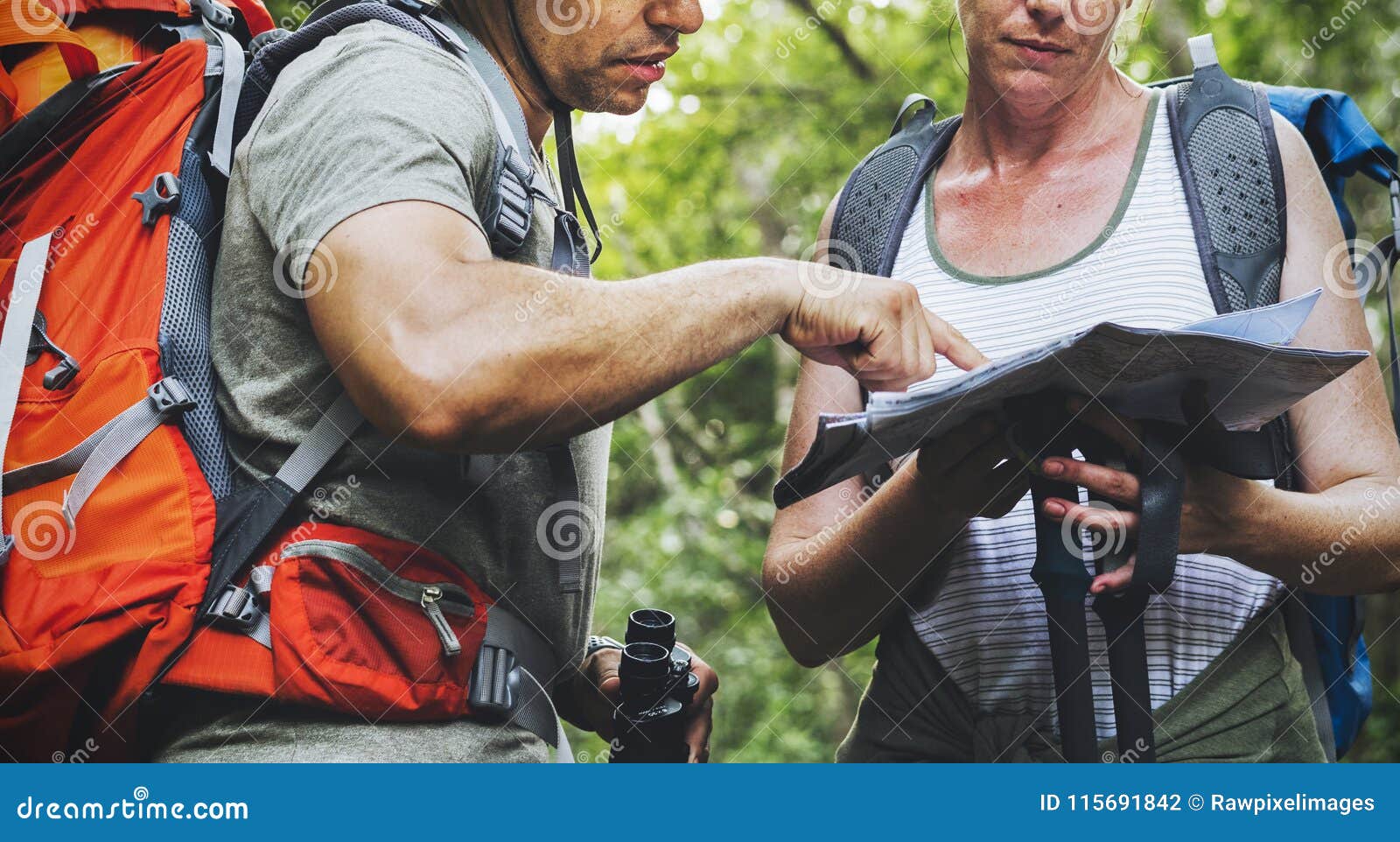 Checking on the Map for Directions Stock Photo - Image of jungle ...