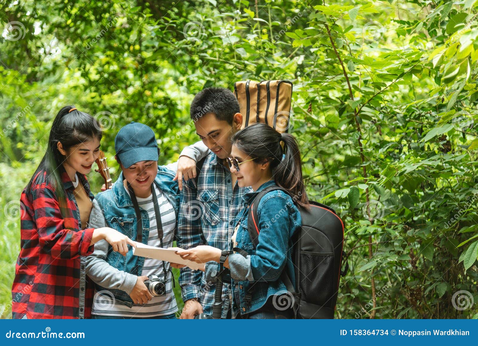 Checking on the Map for Directions Stock Photo - Image of adventure ...