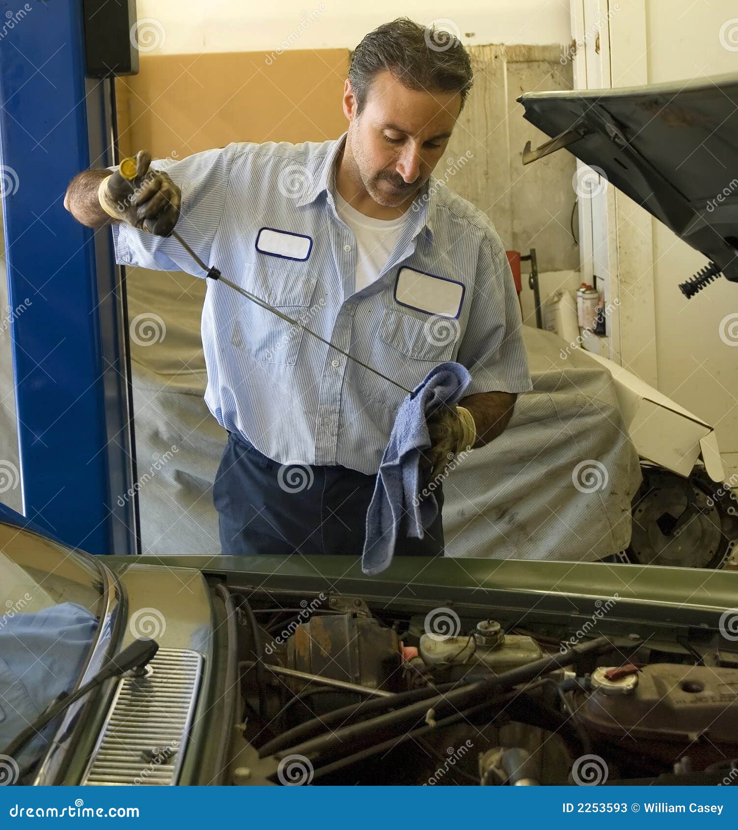 Checking the oil stock image. Image of employment, dirty - 2253593
