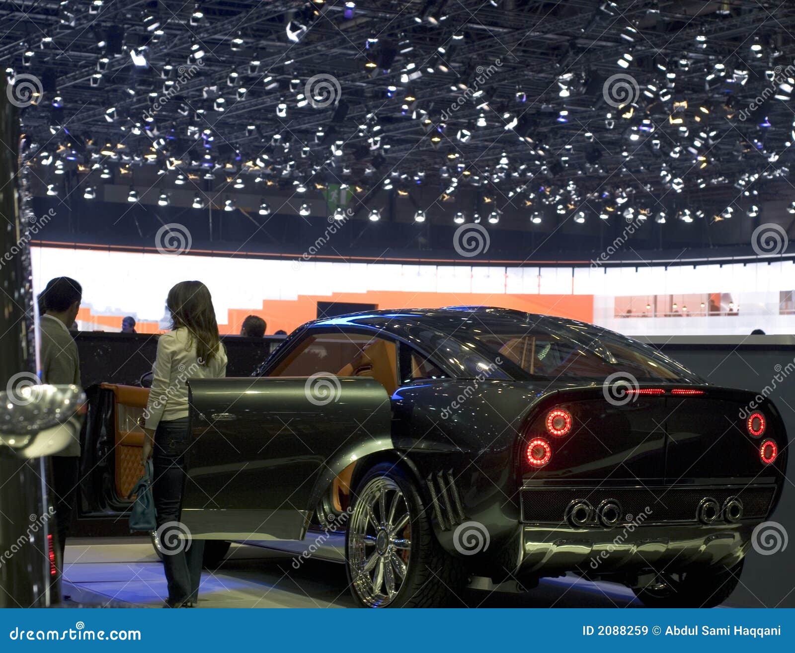 Checking out a sports car stock image. Image of hubs, sporty - 2088259