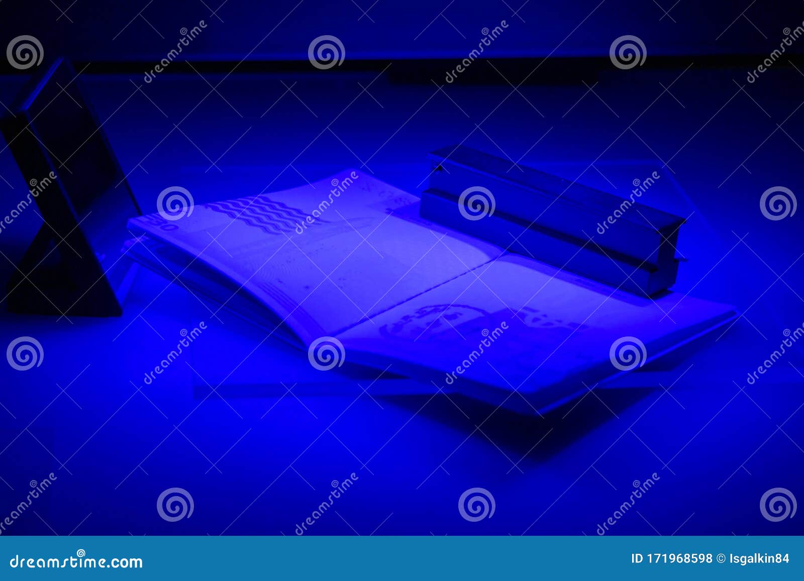 Checking the Passport for Fraud in UV and Another Light, Detection of ...
