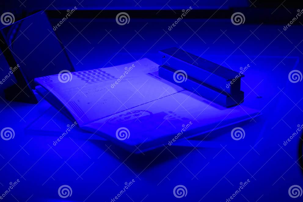 Checking the Passport for Fraud in UV and Another Light, Detection of ...