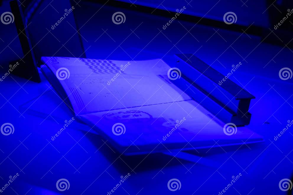 Checking the Passport for Fraud in UV and Another Light, Detection of ...