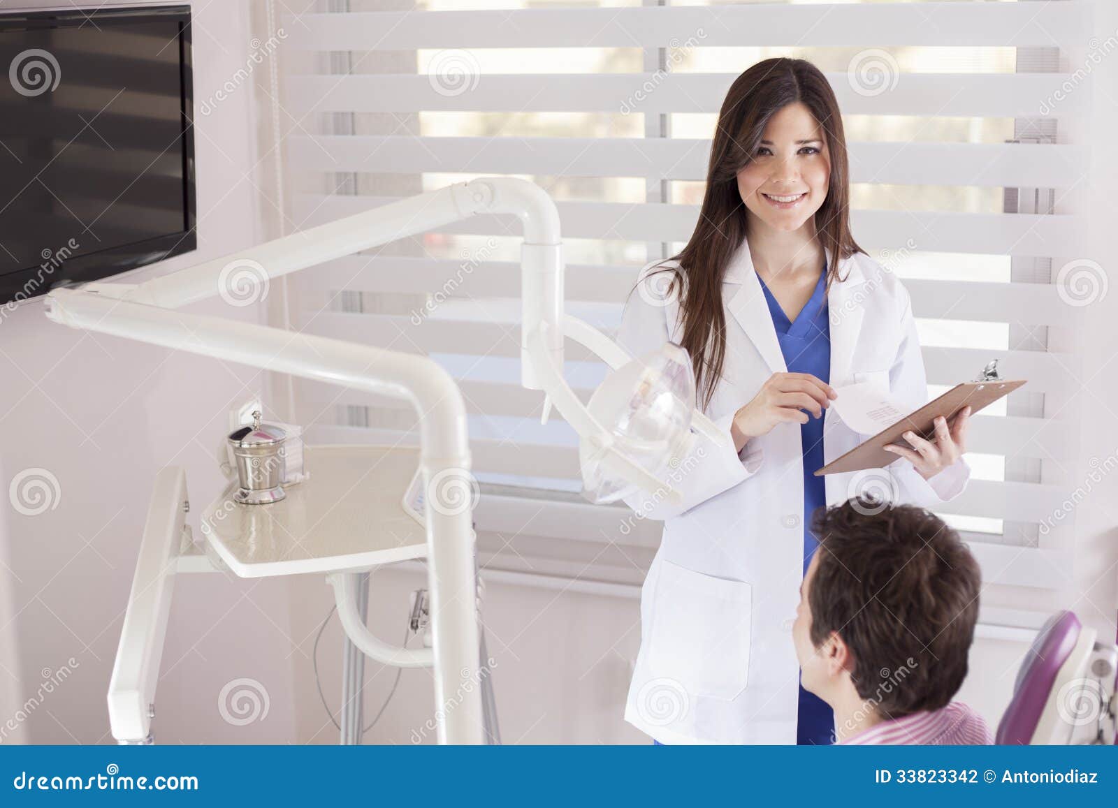 Checking patient chart stock photo. Image of review, file - 33823342