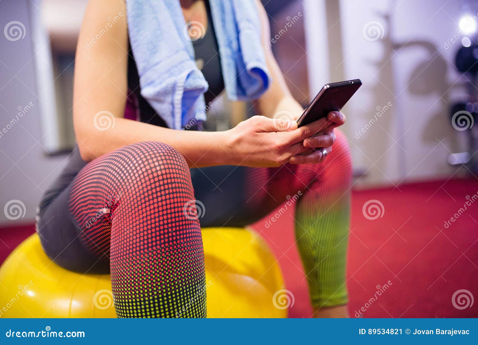 Checking phone at gym stock image. Image of human, health - 89534821