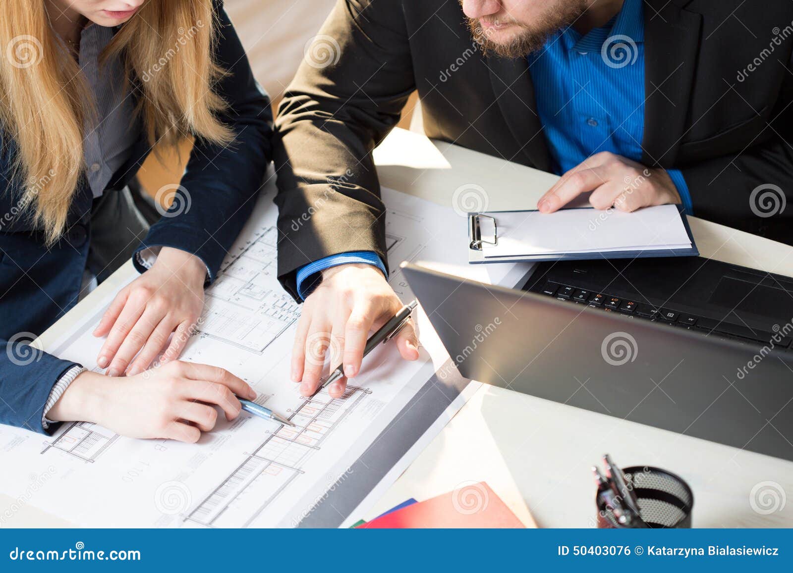 Checking the plan stock photo. Image of people, communication - 50403076