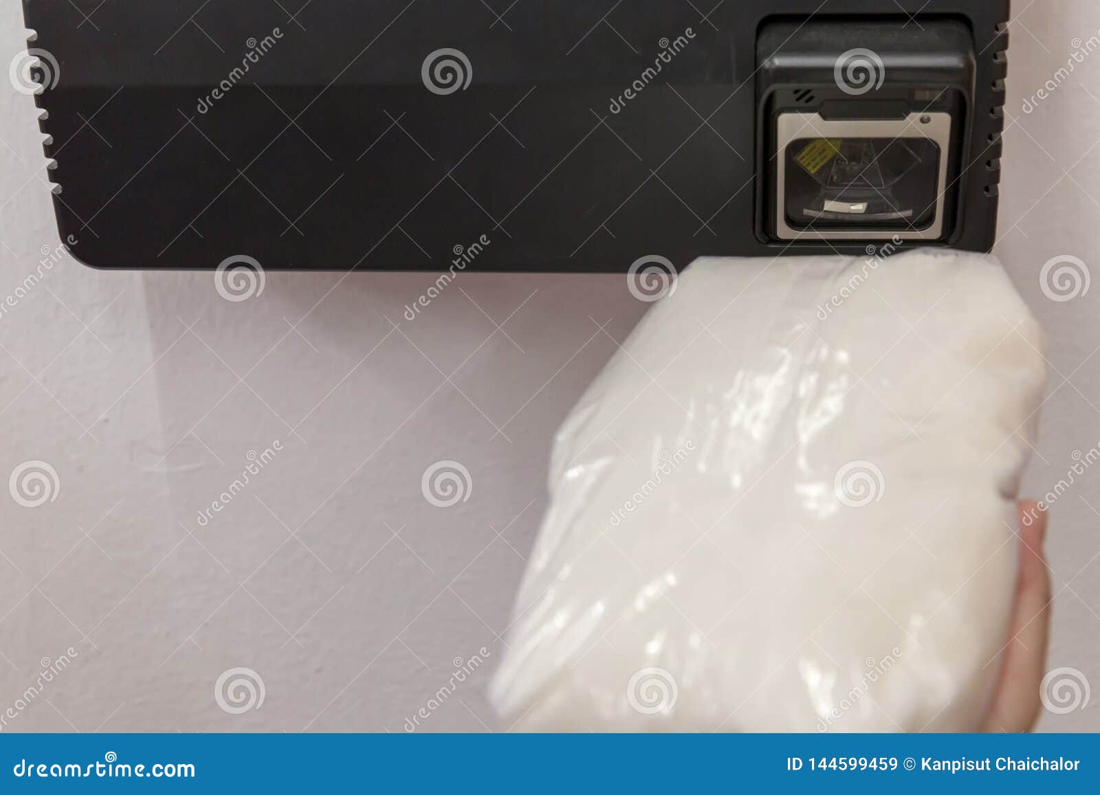 Checking the Price of the Sugar on the Scanner at the Grocery Store ...