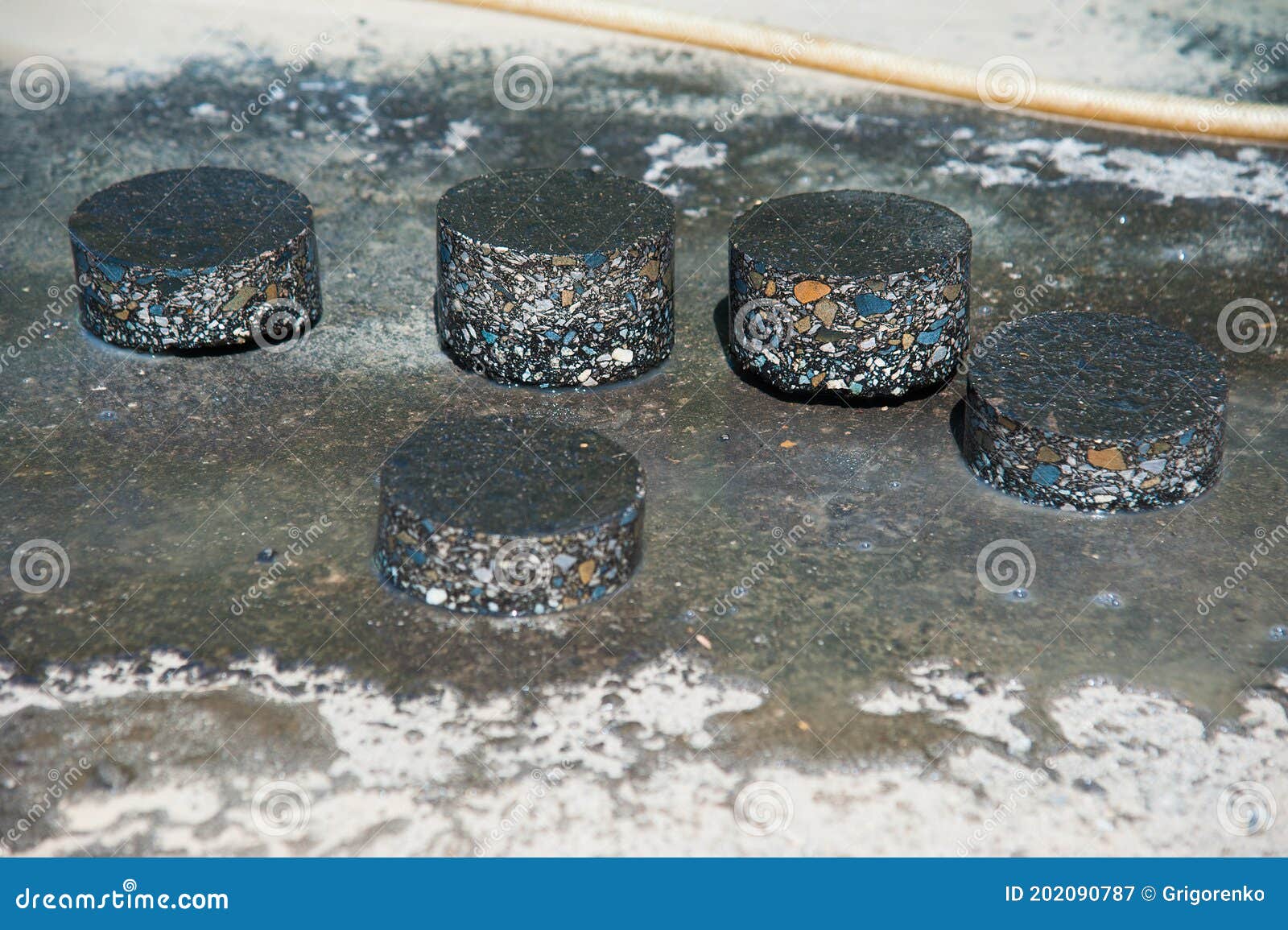 Checking the Quality of Asphalt by Taking Samples and Measuring the ...