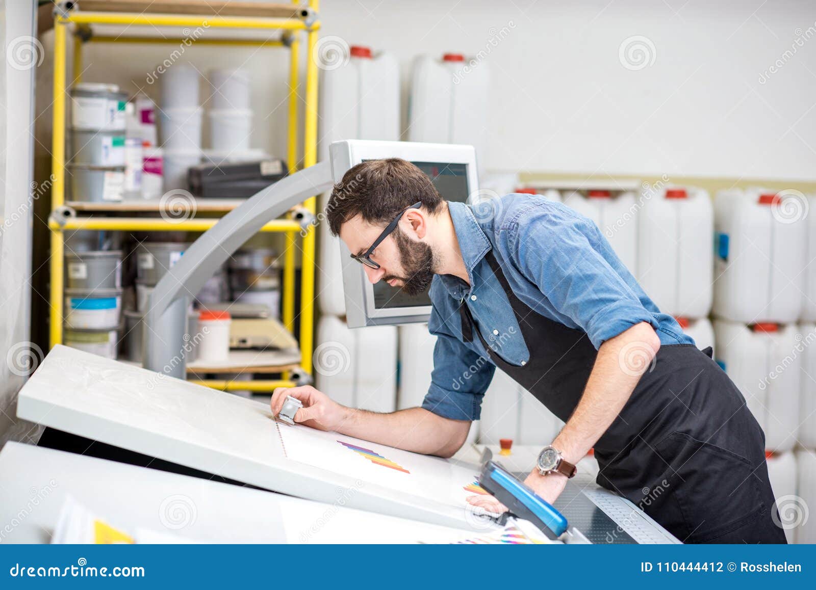 Checking the Quality of the Printing with Magnifying Glass Stock Photo ...