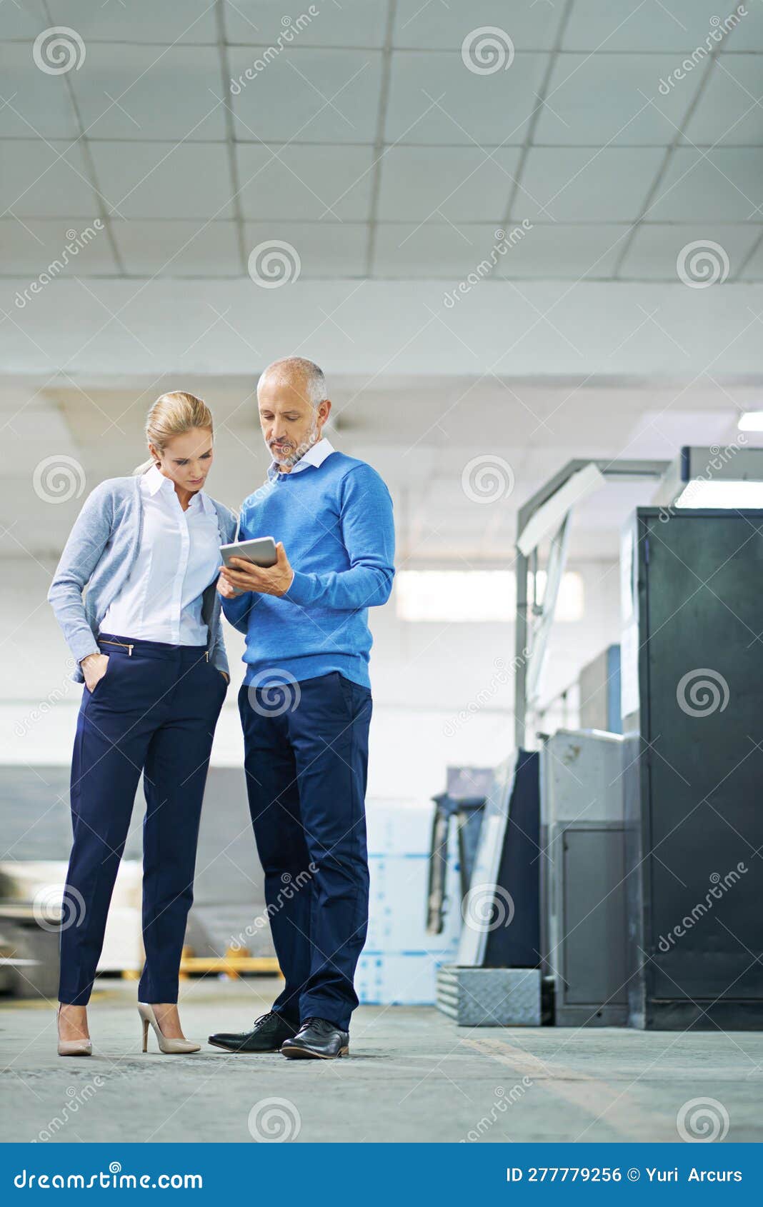 Checking and Rechecking the Inventory. Two Managers Working with a ...