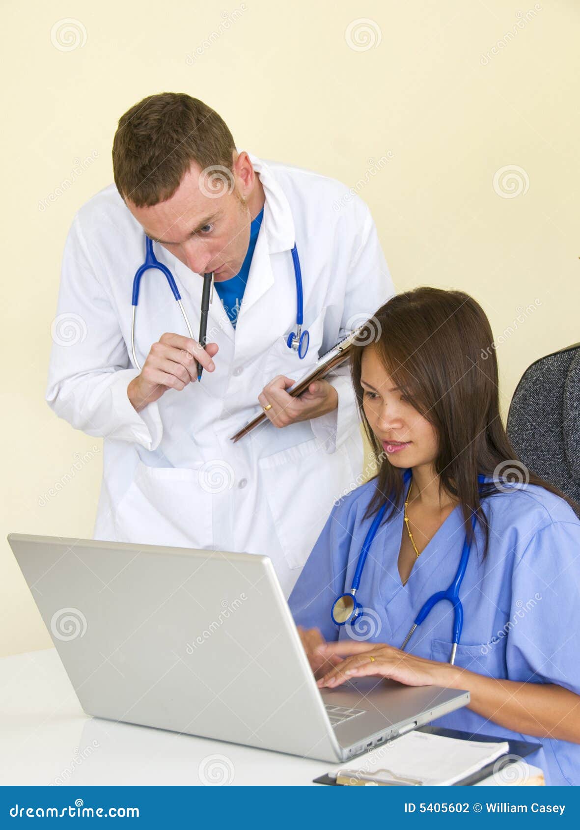 Checking records stock photo. Image of intern, stethoscope - 5405602