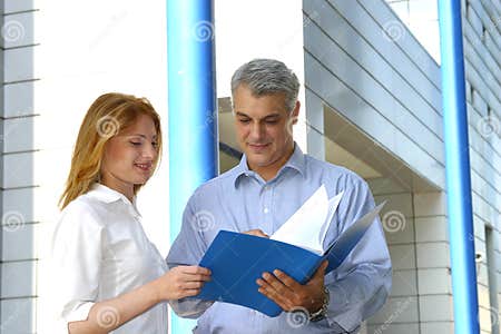 Checking the report. stock photo. Image of attractive - 1557482