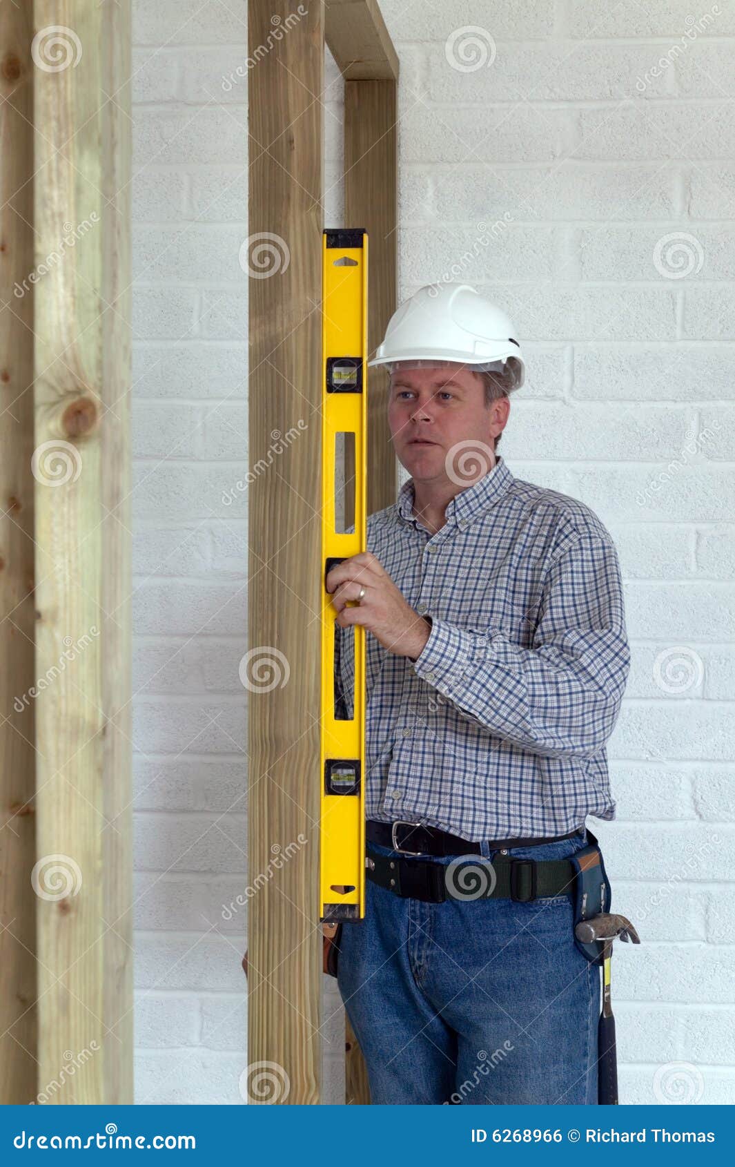 Checking it s level stock photo. Image of male, occupation - 6268966