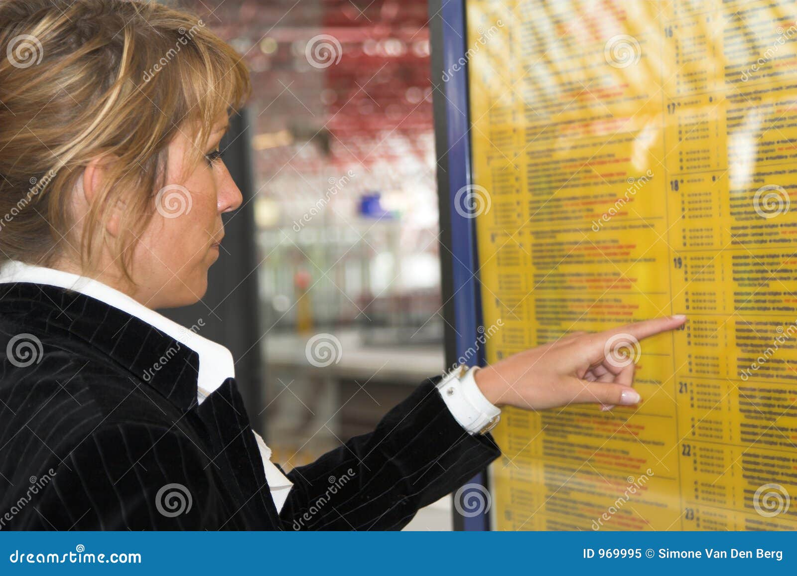 Checking the schedule stock image. Image of departure, businesswomen ...