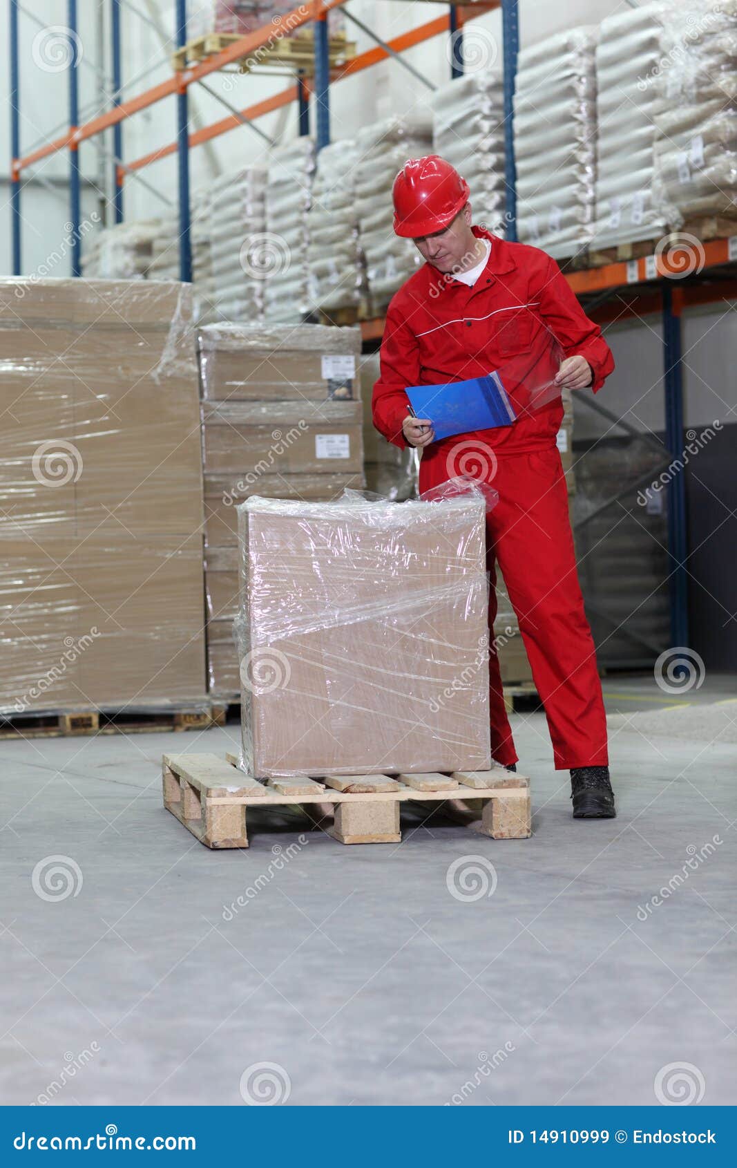 Checking Stocks stock image. Image of coveralls, helmet - 14910999