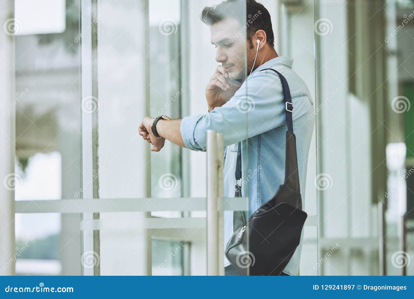 Checking time stock image. Image of lifestyle, airport - 129241897