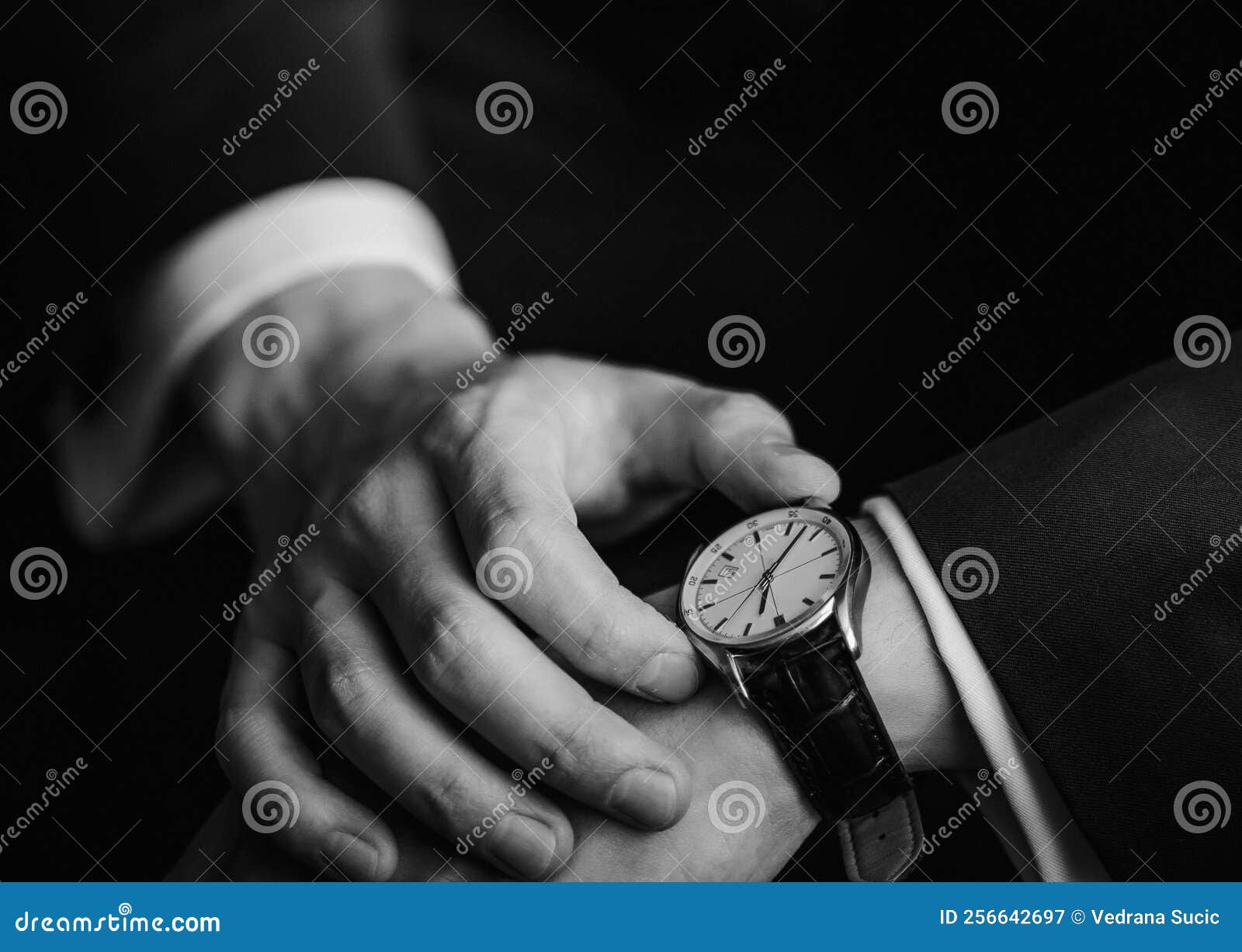 Checking time on watch stock image. Image of modern - 256642697