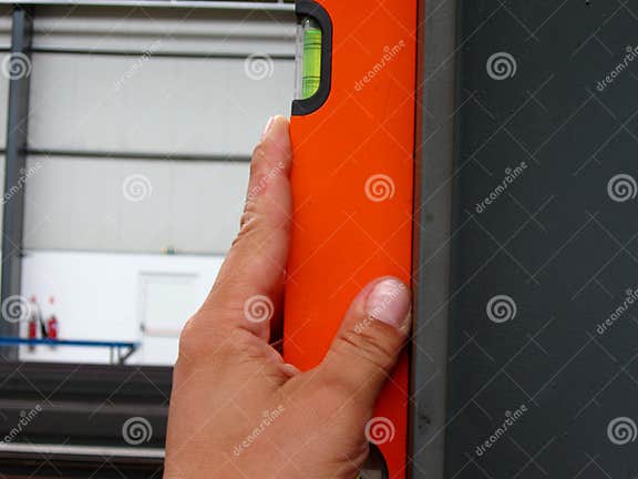Check the Verticality of the Columns Stock Photo - Image of compare ...