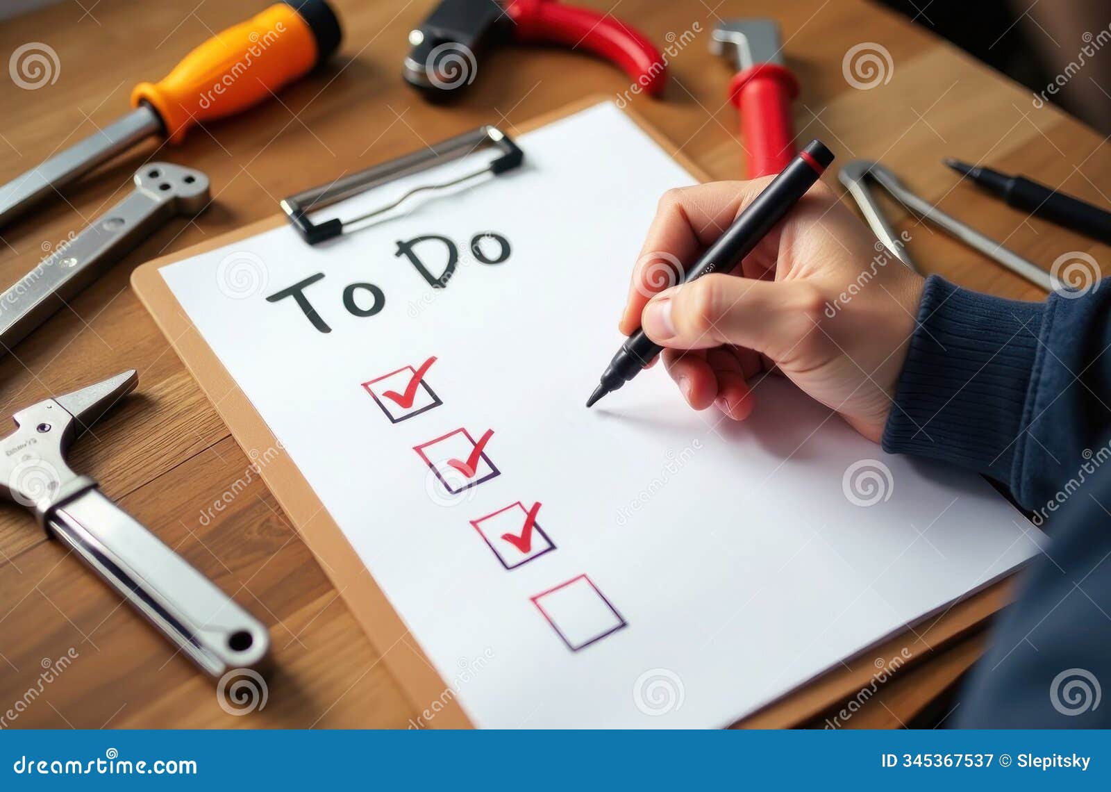 A Checklist is Being Marked with Completed Tasks while Various Tools ...
