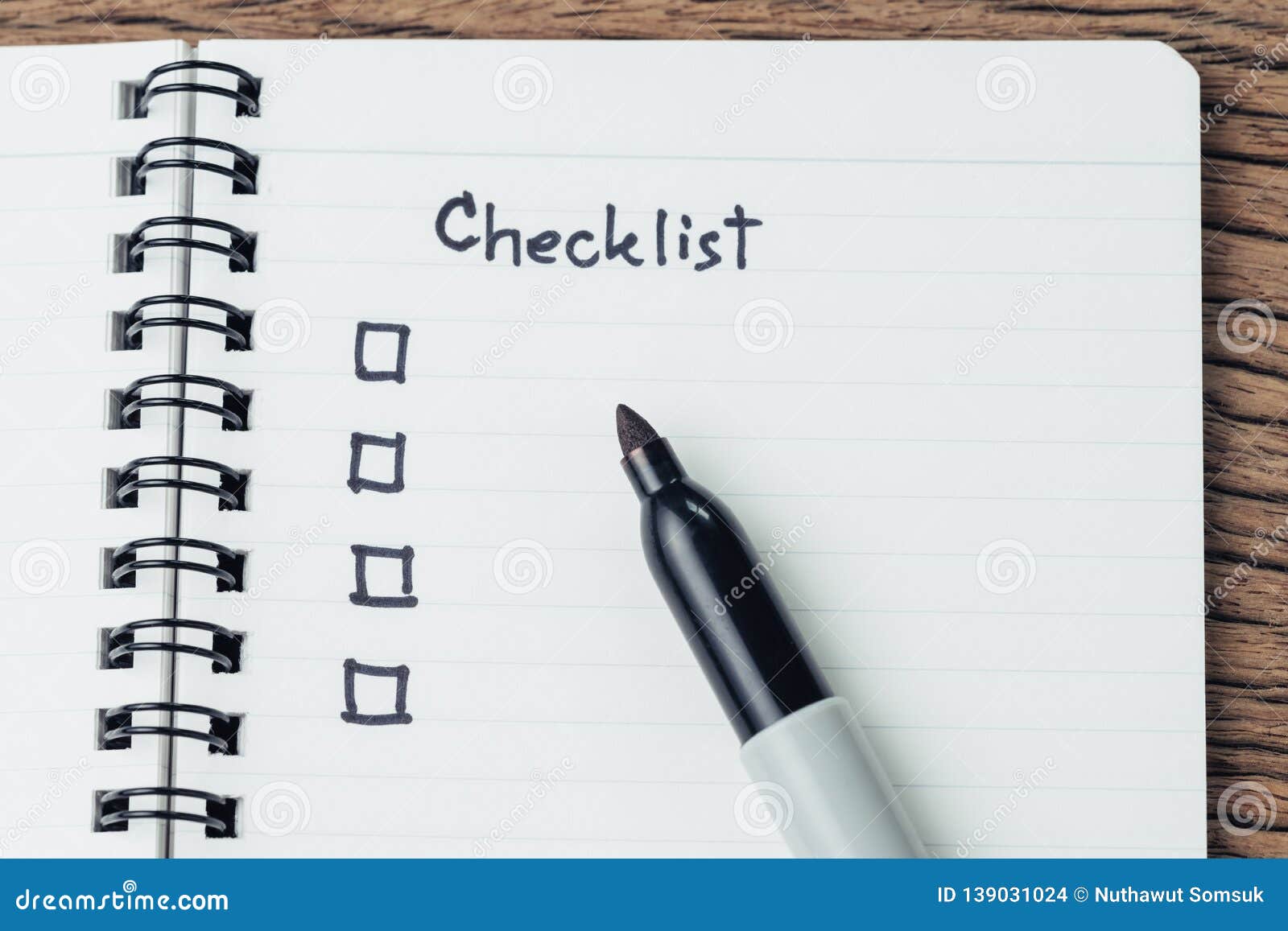 Checklist with Marker Pen and Check Box on Small Notepad on Wood Table ...