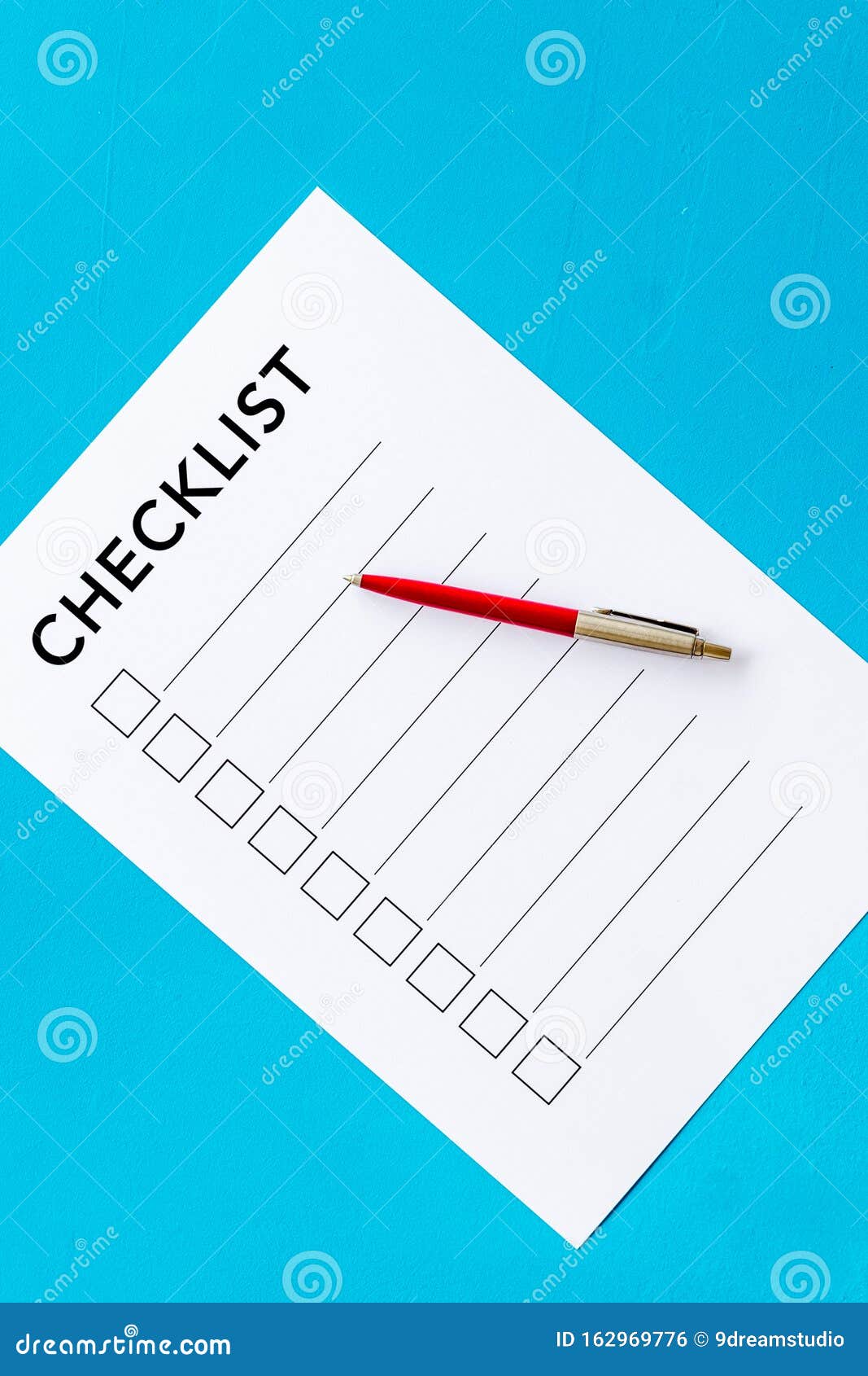 Checklist and Pen on Blue Background Top View Copy Space Stock Photo ...