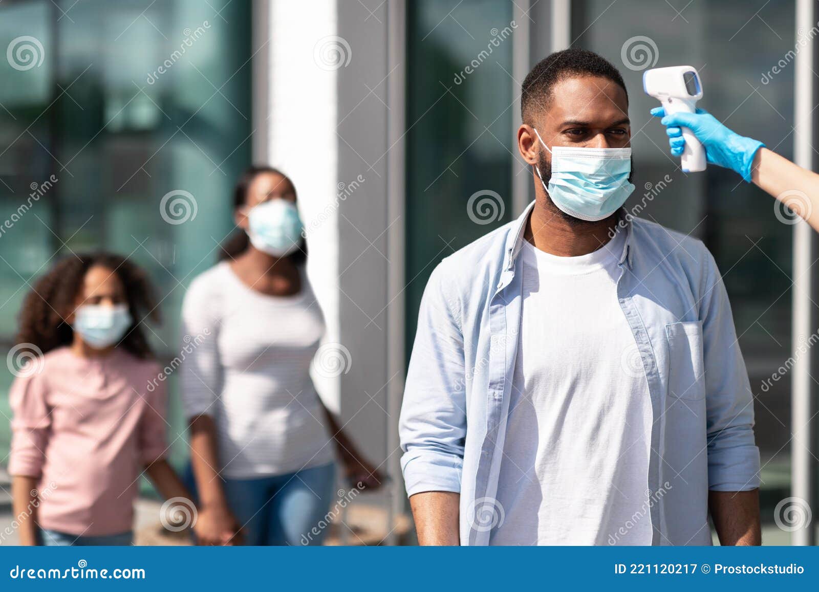 Medical Worker Checking Body Temperature of Black Male Tourist Stock ...