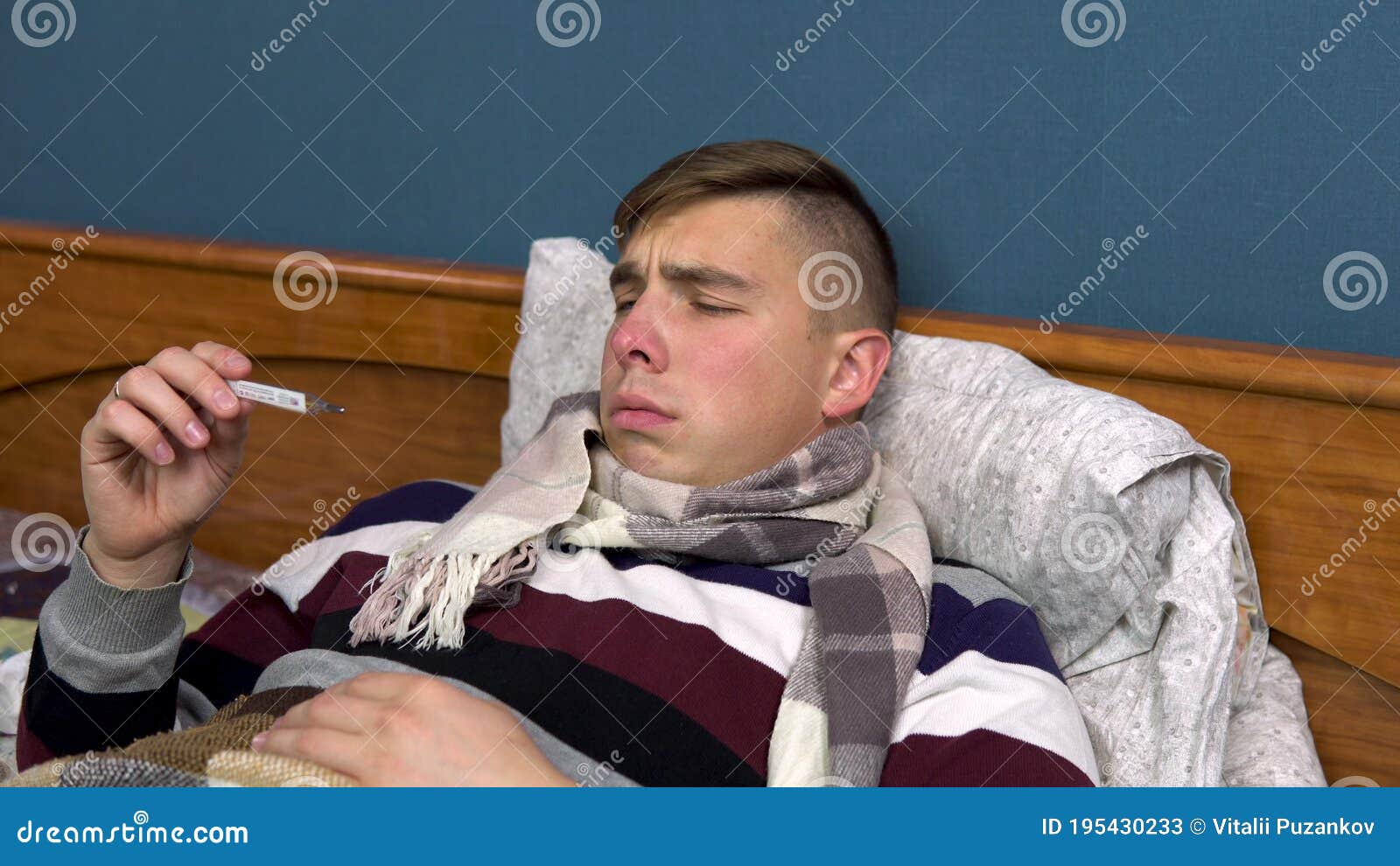 Checks the Temperature on the Thermometer and is Sad Stock Image ...