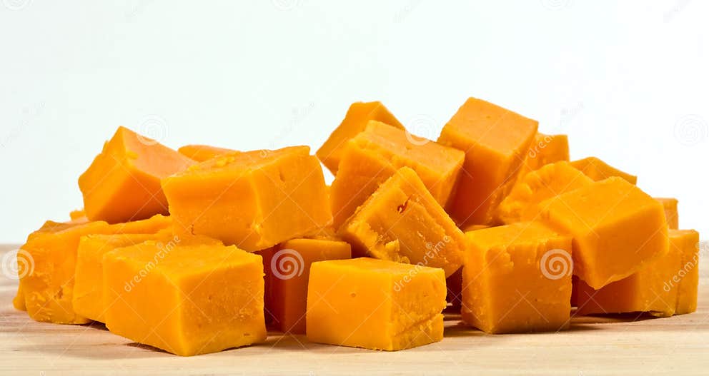 Cheddar Cheese Cut Onto Cubes. Stock Photo - Image of cheddar, milk ...