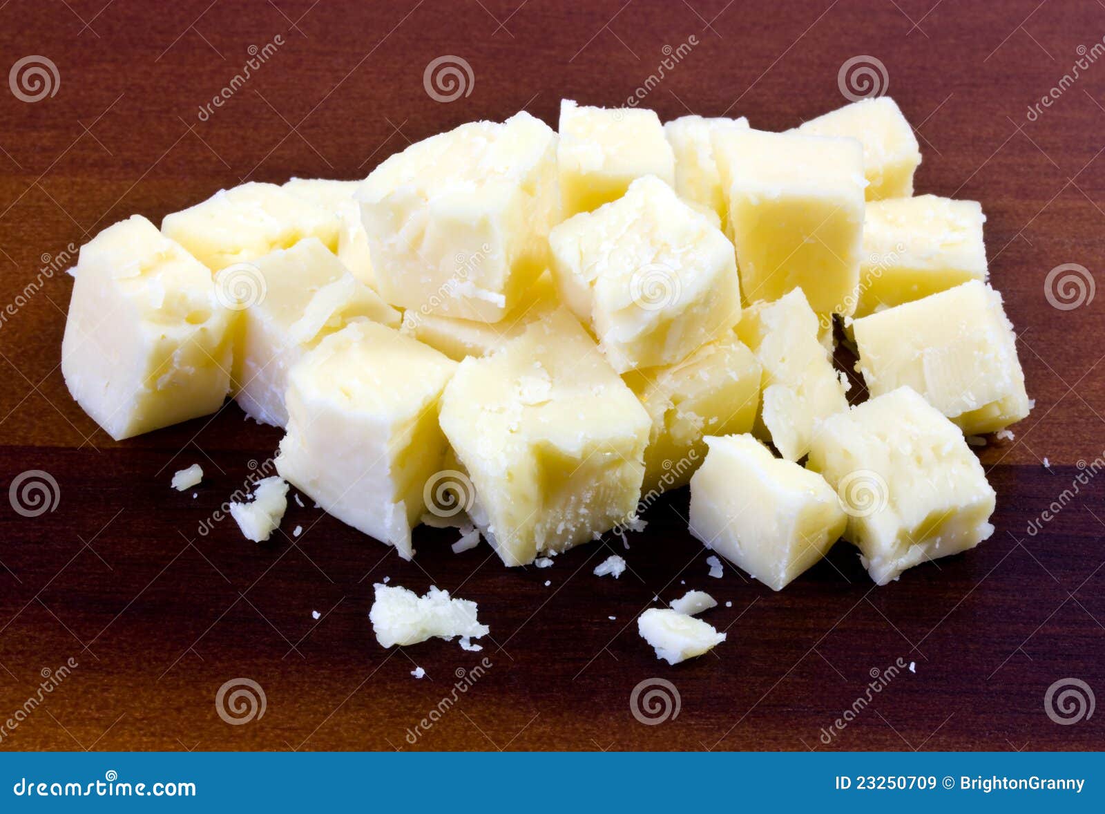 Cubed cheddar cheese. stock image. Image of blocks, snack - 23250709